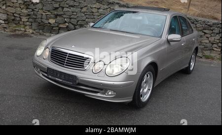 Isolated Mercedes-Benz E class - alias W211, gold metallic colour ...