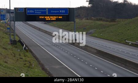 Glasgow, UK. 28th Mar, 2020. Pictured: Road signs all along the M8 and ...