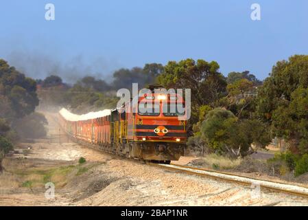 Freight train carrying gypsum running on an isolated line from Kevin to ...