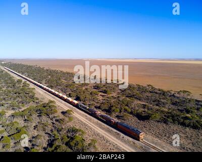 Freight train carrying gypsum running on an isolated line from Kevin to ...