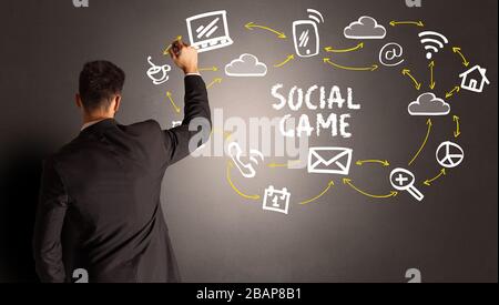 businessman drawing social media icons Stock Photo - Alamy