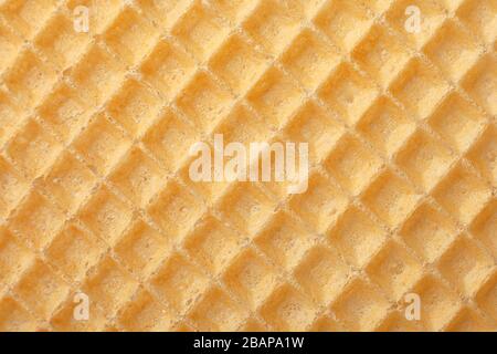 Yellow waffles surface closeup detail background Stock Photo - Alamy