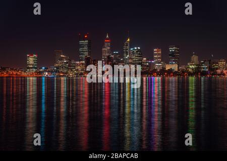 Perth City Skyline at night over the Swan River Stock Photo - Alamy