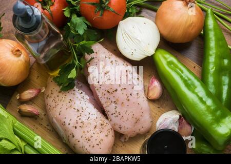 Chicken fresh meat with vegetables was photographed in the studio Stock ...