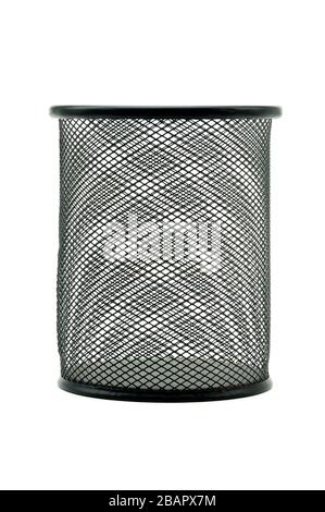 A metal grid container with pencils on a wooden table Stock Photo - Alamy