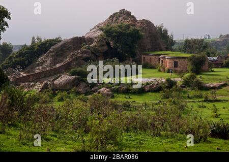 Bungalow of the Gheralta Lodge in front of the Gheralta Mountain Massif ...