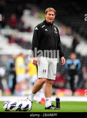 Fulham head coach Michael Lindeman takes the warm up Stock Photo - Alamy