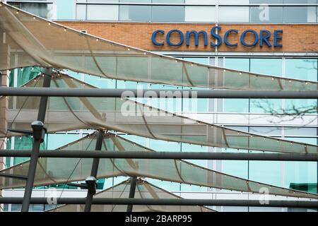 A logo sign outside of the headquarters of Comscore in Reston, Virginia ...