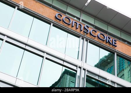 A logo sign outside of the headquarters of Comscore in Reston, Virginia ...