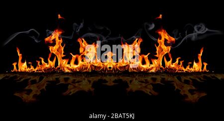 Long fire flames burning isolated on black background Stock Photo - Alamy
