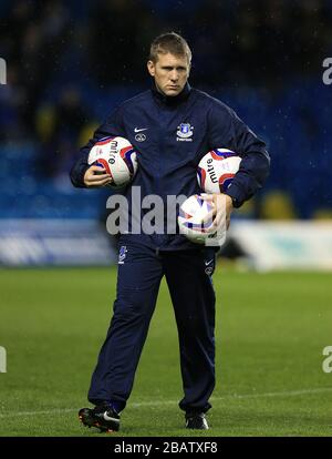 Everton assistant manager Steve Round (left), physio Dominic Rogan (2nd ...