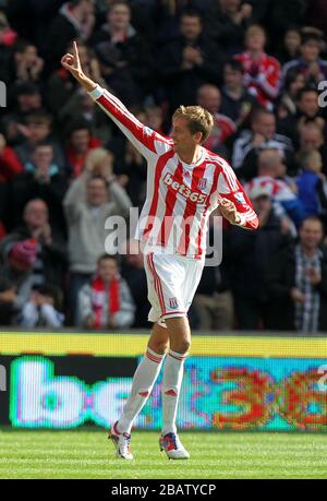 Stoke City's Peter Crouch celebrates scoring his side's first goal ...