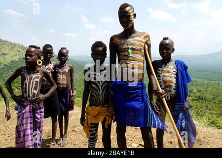 Mursi Tribe boys of Omo Valley, Ethiopia Stock Photo - Alamy