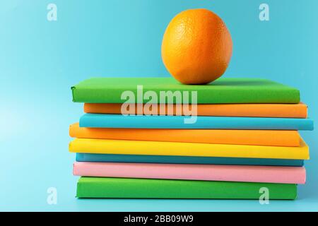 A stack of books, textbooks. Distance learning. Schoolboy is doing ...