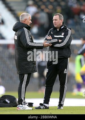 Fulham assistant manager Rene Meulensteen (centre) and goalkeeping ...