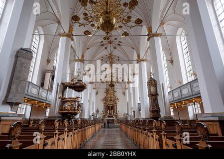 Interior of Trinitatis Kirke in Copenhagen, Denmark. Ornate altar and ...