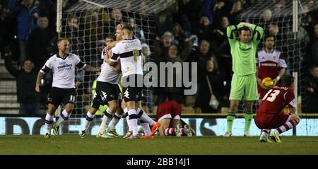 Derby County's players celebrate with Conor Sammon after his late ...
