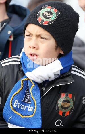 A young fan waits for players to arrive before the Sky Bet Championship ...