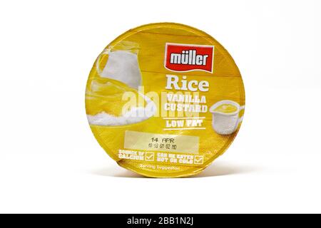 Muller Rice Vanilla Custard on a white background Stock Photo - Alamy