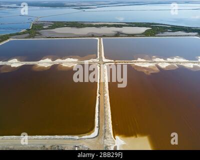 Salt harvesting using solar evaporation ponds at Port Alma Queensland ...