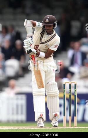 Surrey's Arun Harinath hits out Stock Photo - Alamy