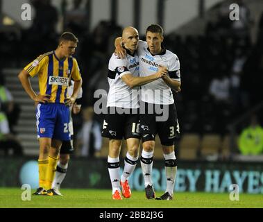 Derby County's Craig Forsyth (centre) celebrates after scoring his ...