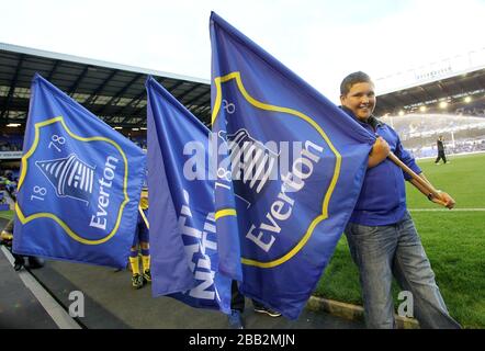 Everton flags paraded around the pitch Stock Photo - Alamy
