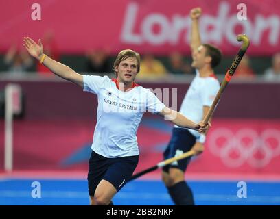 England's Ashley Jackson (R) celebrates her goal with Rob Moore and ...