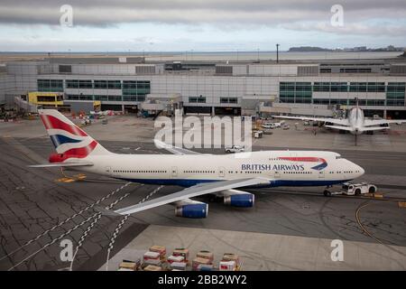Emergency crash gate at airport runway red diamond warning sign. Gates ...