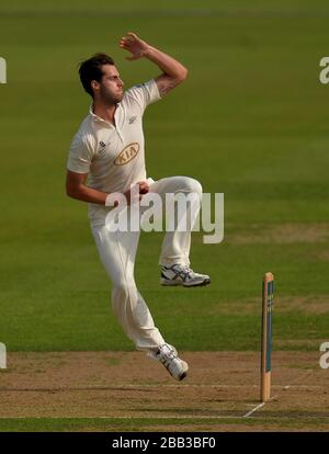 Surrey's Tom Jewell bowls Stock Photo - Alamy