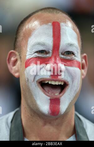 An England fan in the stands shows off his Sheffield Wednesday and ...