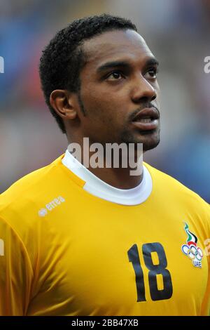 United Arab Emirates' goalkeeper Khalid Eisa fails to stop the kick by ...