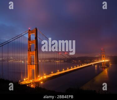 A panorama of Golden Gate Bridge at dawn on a cold November morning ...