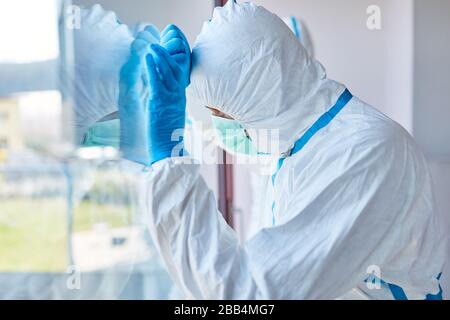 Covid-19 coronavirus epidemic overloads caregiver in protective ...