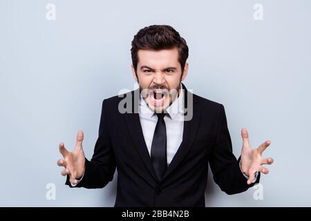 portrait of young angry man sreaming isolated Stock Photo - Alamy
