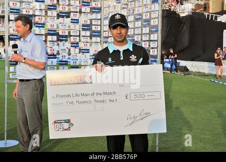 Surrey's Vikram Solanki with his man of the match cheque Stock Photo ...