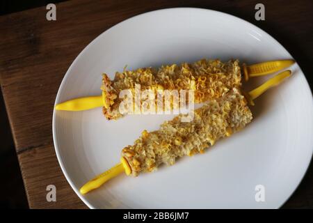 Corn on the cob leftovers Stock Photo - Alamy