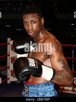 Tony Randell (Birmingham, blue shorts) defeats Wayne Downing (West ...
