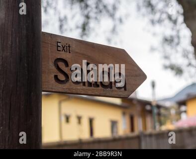 Exit sign written in Spanish and English in the Station Stock Photo - Alamy