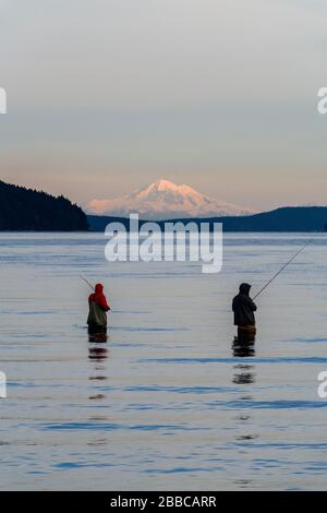 Two fishermen fishing near the ocean, Cape town Stock Photo - Alamy