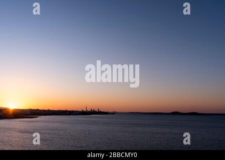 Sunset over Waitemata Harbour, Auckland in the North Island, New ...