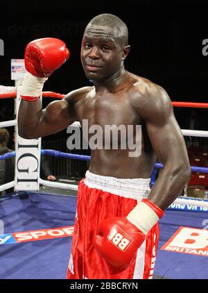 Erick Ochieng (red shorts) defeats Alex Spitko in a Middleweight boxing ...
