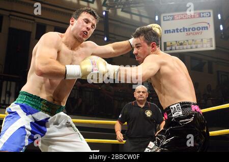 Daniel Cadman (black/pink shorts) defeats Eddie McIntosh in Round One ...