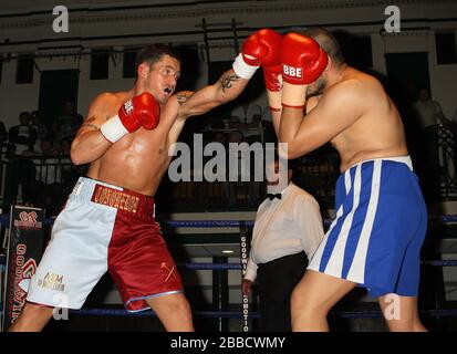 Tony Conquest (claret/blue shorts) defeats Tayar Mehmed in a ...