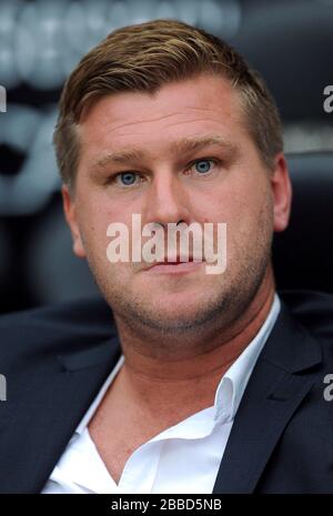 MK Dons manager Karl Robinson (left) with chairman Peter Winkelman ...