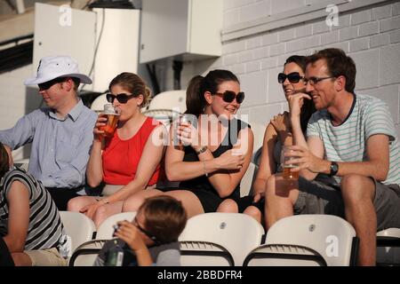 The crowd enjoy the action from the stands at the Kia Oval Stock Photo ...