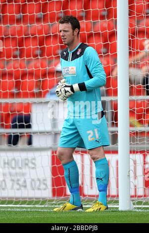 Rotherham United goalkeeper Adam Collin celebrates with team mates ...