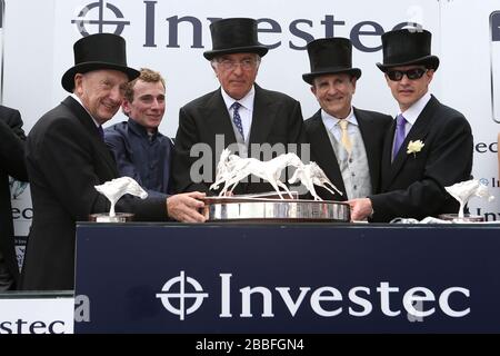 (L to R) Ruler of the World owner Derrick Smith, jockey Ryan Moore ...