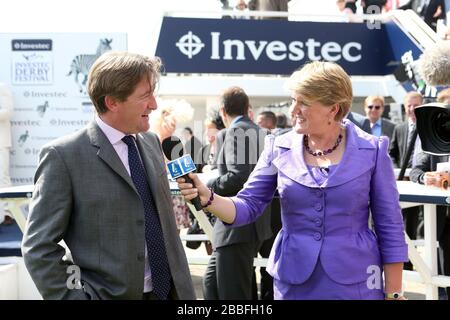 Trainer David Simcock (left) is interviewed by Channel Four TV ...