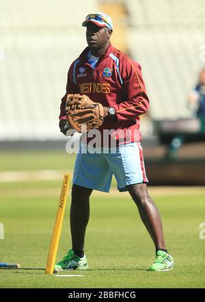 West Indies' cricket coach Ottis Gibson, left, and England's coach Andy ...